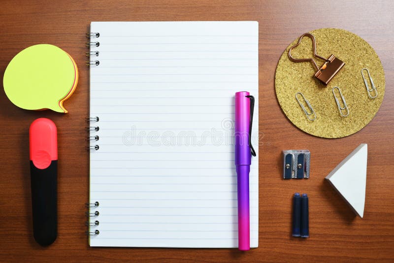 Notebook with Important Message on Desk with Pen, Sharpener, Notes ...