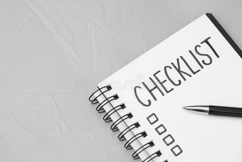 Notebook with Inscription Checklist on Light Grey Table, Top View ...
