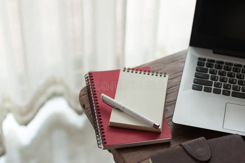 Notebook and Laptop Computer on Wood Table Stock Image - Image of ...