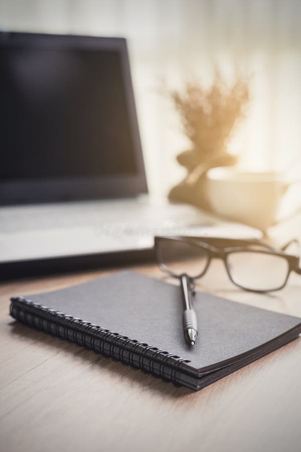 Notebook and Laptop in Home Office with Soft Light Stock Image - Image ...