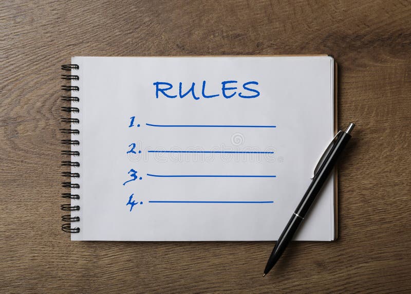 Notebook with List of Rules and Pen on Table, Top View Stock Photo ...