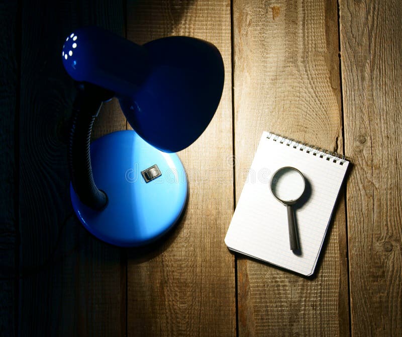 Notebook and Magnifier in the Light of Lantern. Stock Image - Image of ...