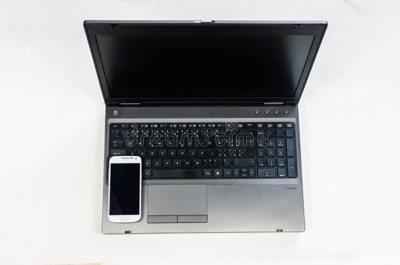 Notebook and mobile phone stock image. Image of portable - 60895713