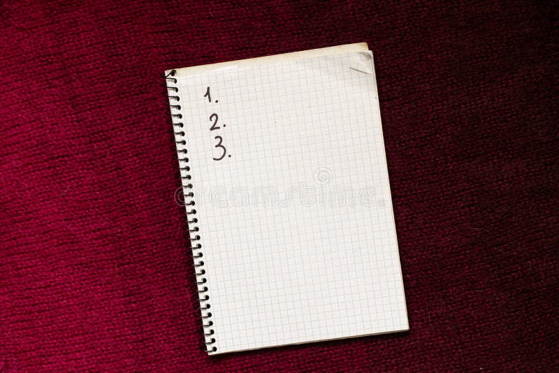 Notebook with Numbers 123 Lies on a Red Knitted Sweater, Space for Text ...