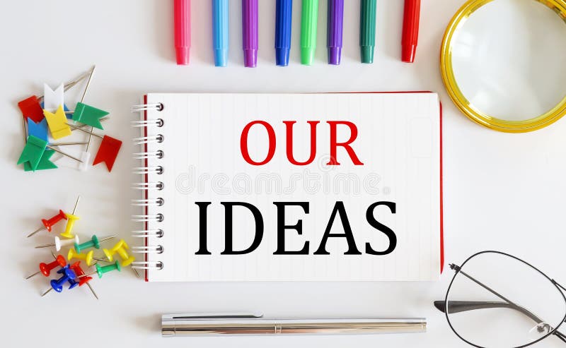Notebook with OUR IDEAS Word with Office Tools on the White Table Stock ...