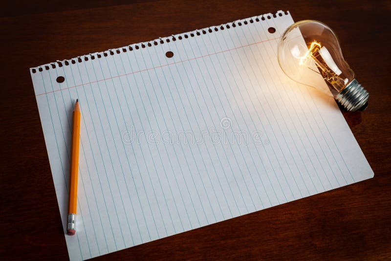 Notebook Paper and Light Bulb Stock Image - Image of notebook, creative ...