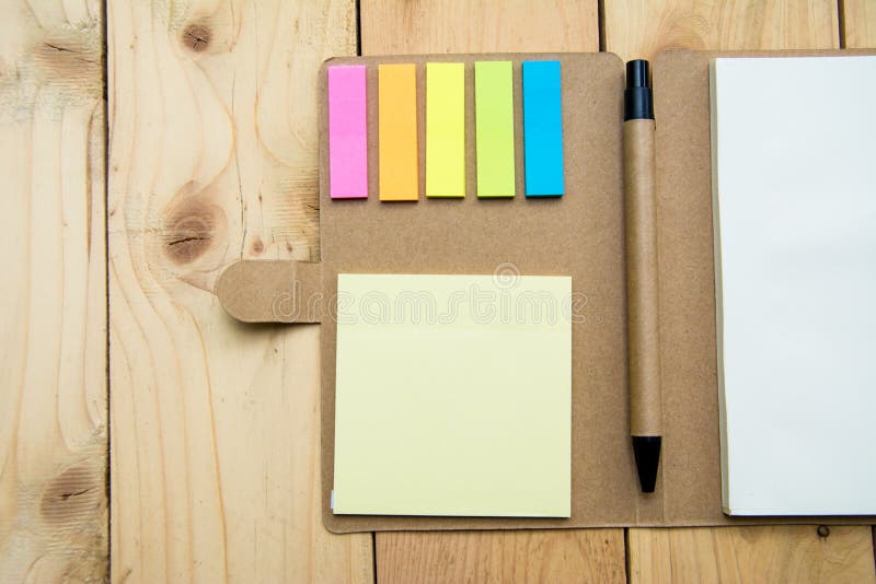 Notebook Paper, Post it and Pen Top View on Wood Pallet Stock Photo ...