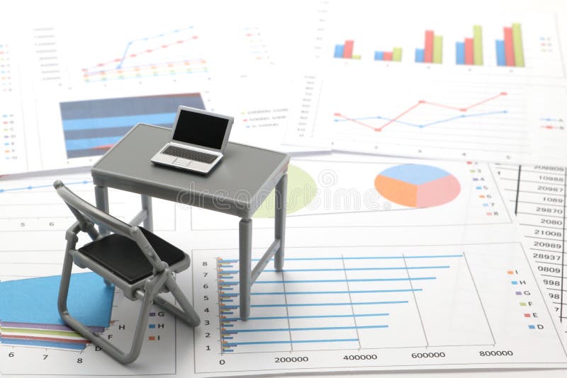 Notebook PC and Business Documents with Numbers and Charts. Stock Photo ...