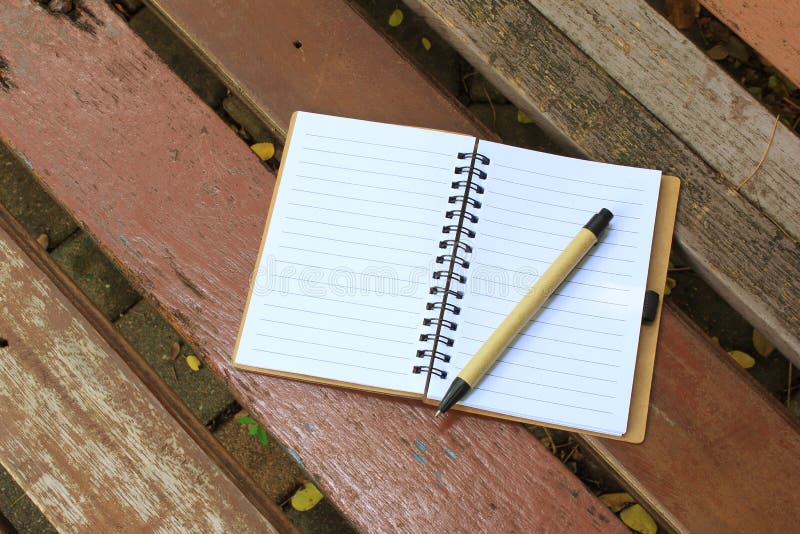 Notebook and Pen on the Brown Bench Stock Photo - Image of desktop ...