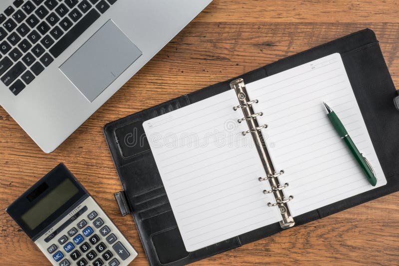 Notebook and Pen with Calculator on the Desk Stock Photo - Image of ...