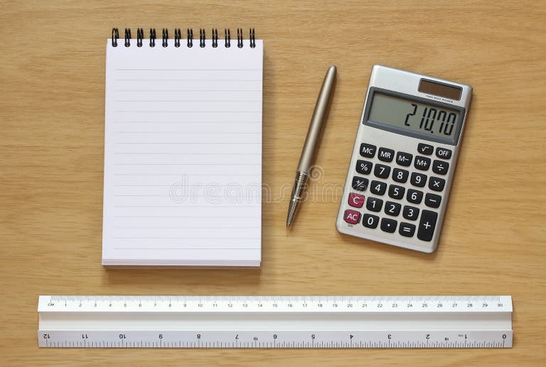 Notebook Pen Calculator and Ruler on Desk Stock Image - Image of ...