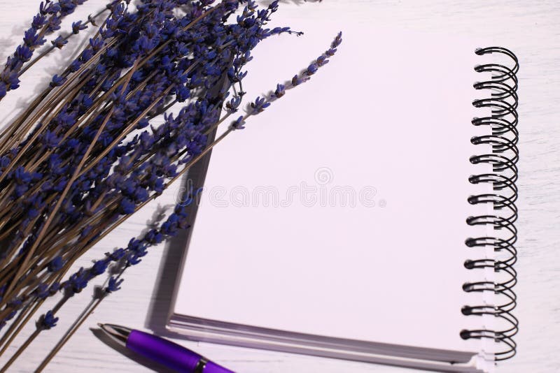Notebook Pen and Lavender Flowers on Desk Stock Image - Image of table ...