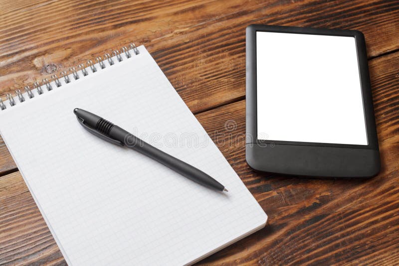 Notebook with Pen, Tablet/e-reader on Wood Table Stock Image - Image of ...