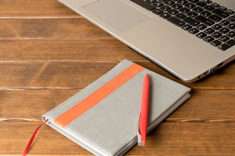 Notebook with Pen and Notebook on Wooden Table. E-learning Concept ...