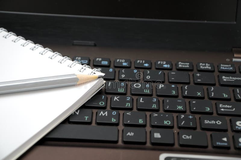 Notebook with Pencil on Keyboard Stock Photo - Image of compact ...