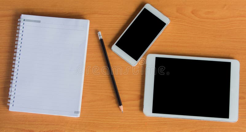 Notebook with a Pencil, Mobile and Tablet. Stock Photo - Image of ...