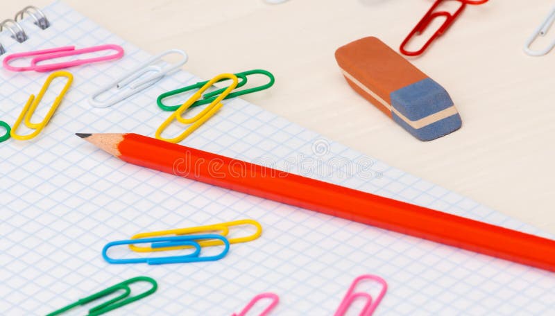Notebook Pencil Paper Clips on a Desk Stock Photo - Image of college ...
