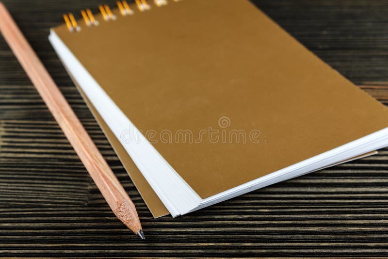 Notebook with Pencil on Wood Stock Photo - Image of paper, scratchpad ...
