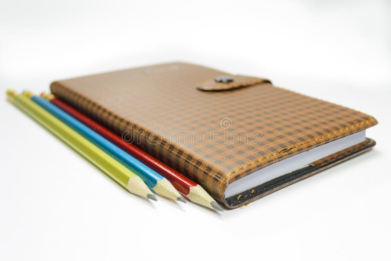 Notebook and pencils stock photo. Image of notebook, stationery - 28855666