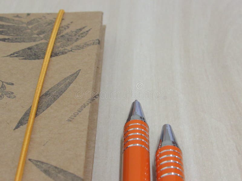 Notebook and pens stock photo. Image of pens, paper - 139327734