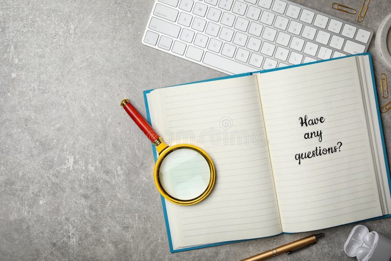 Notebook with Phrase HAVE ANY QUESTIONS and Magnifying Glass on Grey ...