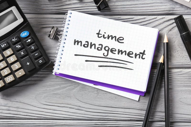 Notebook with Phrase TIME MANAGEMENT on Wooden Table Stock Photo ...