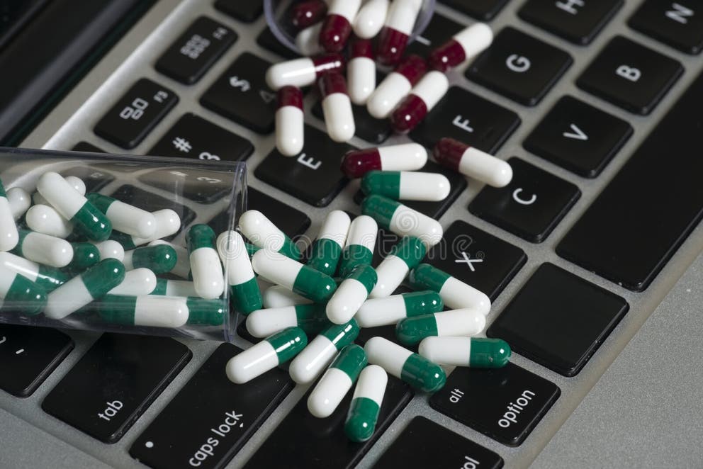 Notebook and pills stock image. Image of notepad, keyboard - 144625659