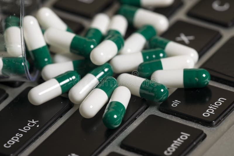 Notebook and pills stock photo. Image of digital, design - 144625692