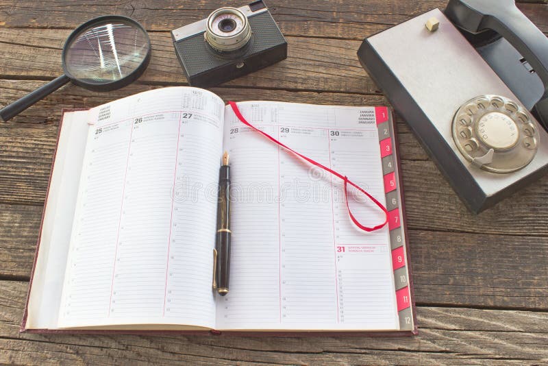 Notebook Planner, Fountain Pen with Telephone and Camera Stock Photo ...