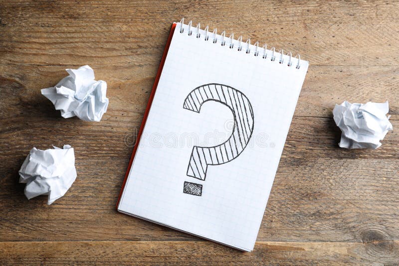 Notebook with Question Mark and Crumpled Paper on Wooden Table Stock ...
