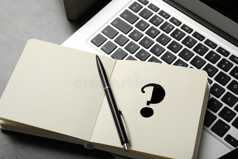 Notebook with Question Mark, Pen and Laptop on Table, Closeup Stock ...