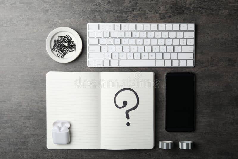Notebook with Question Mark, Smartphone and Keyboard on Table, Flat Lay ...