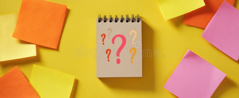 The Notebook with Question Marks Surrounded by Colorful Sticky Notes ...