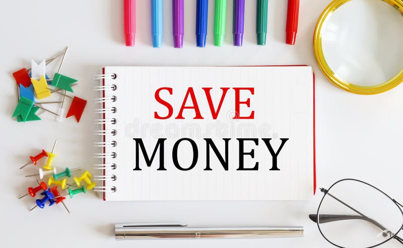Notebook with SAVE MONEY Word with Office Tools on White Table Stock ...