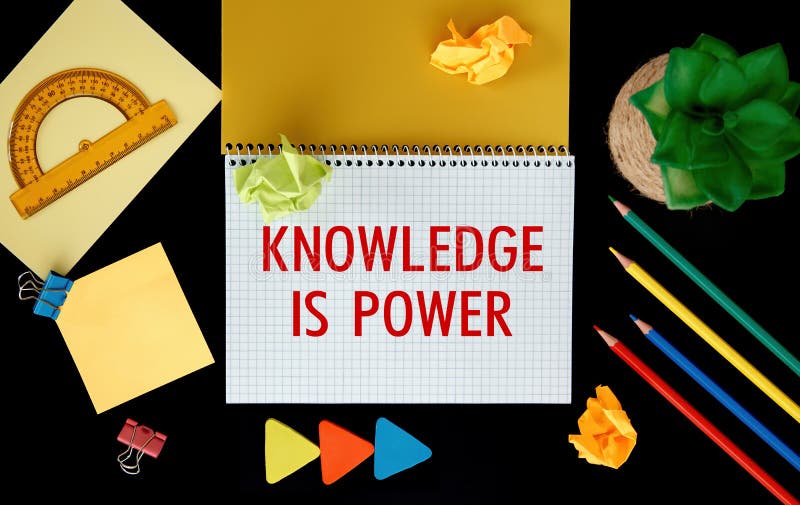 Notebook with School Supplies and the Inscription KNOWLEDGE is POWER ...