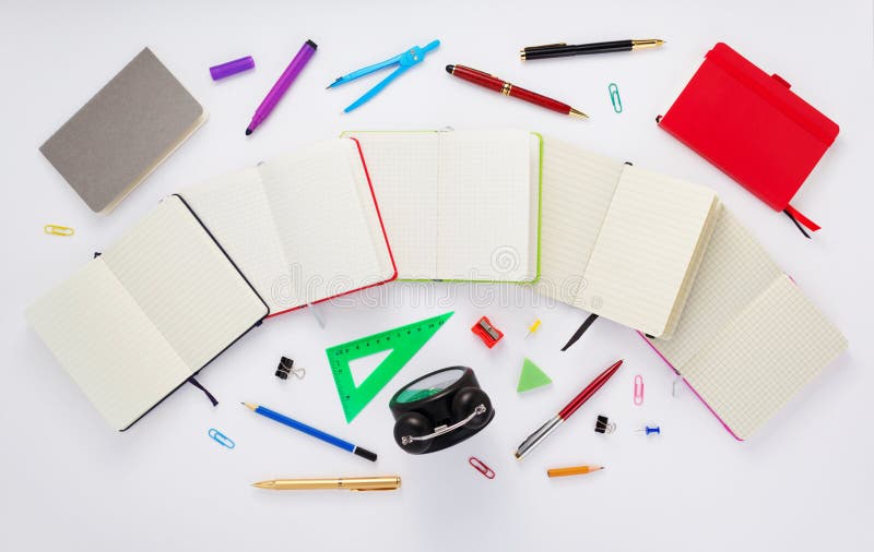 Notebook and School Supplies at White Stock Photo - Image of clock ...