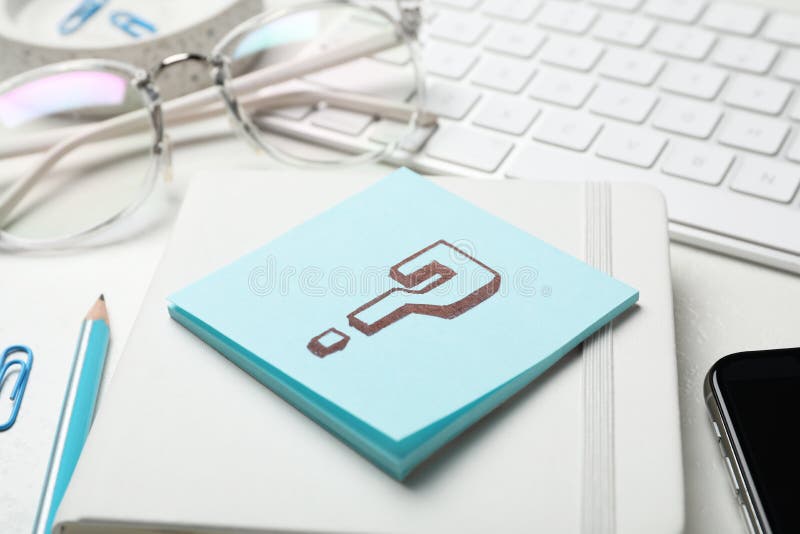 Notebook and Sheet of Paper with Question Mark on Table, Closeup Stock ...