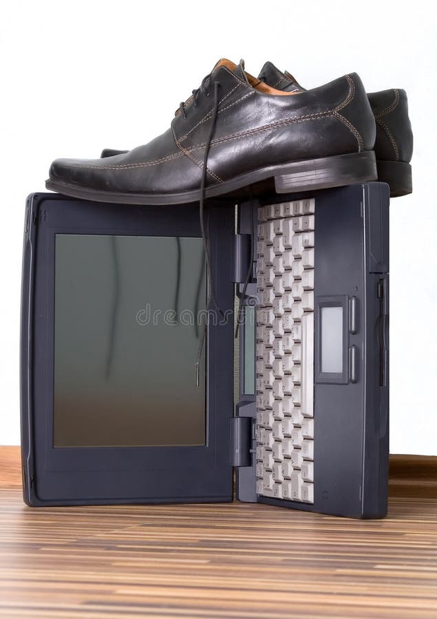 Notebook and shoes stock photo. Image of boot, electronic - 2534302