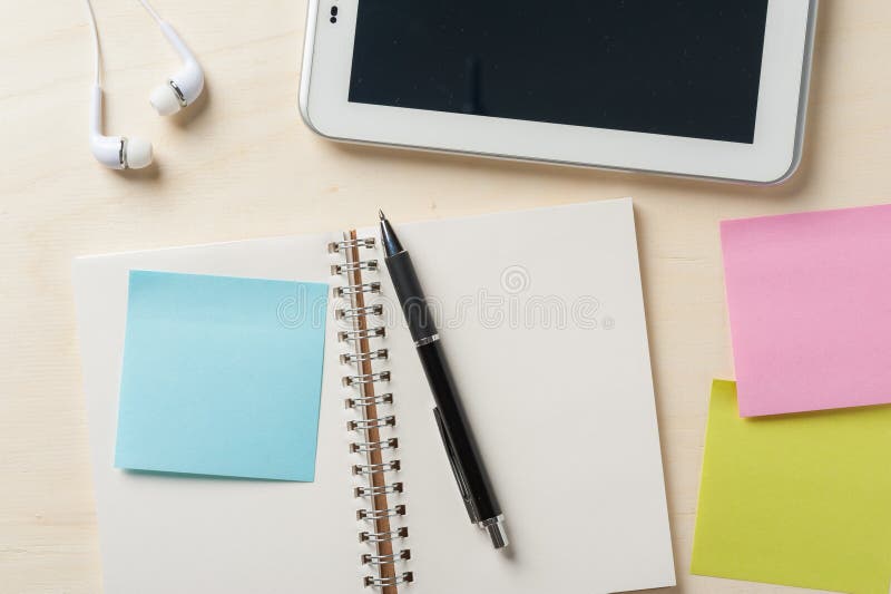 Notebook beside Small Tablet Pc Stock Image - Image of modern, paper ...