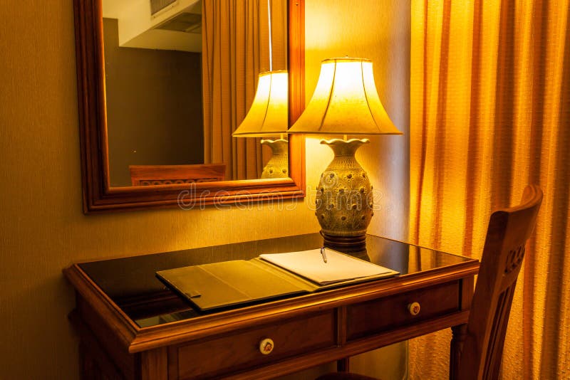 Notebook on the Table with Lamp and Chair in Retro Style Stock Photo ...