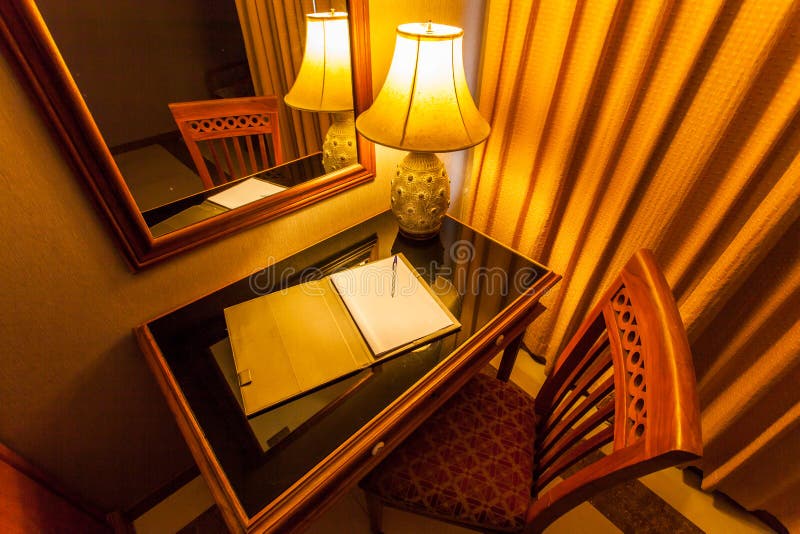 Notebook on the Table with Lamp and Chair in Retro Style Stock Photo ...