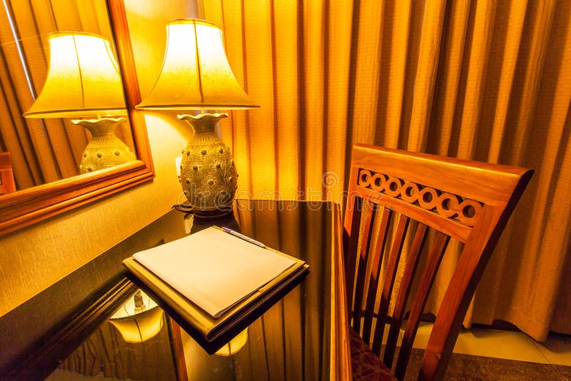 Notebook on the Table with Lamp and Chair in Retro Style Stock Photo ...