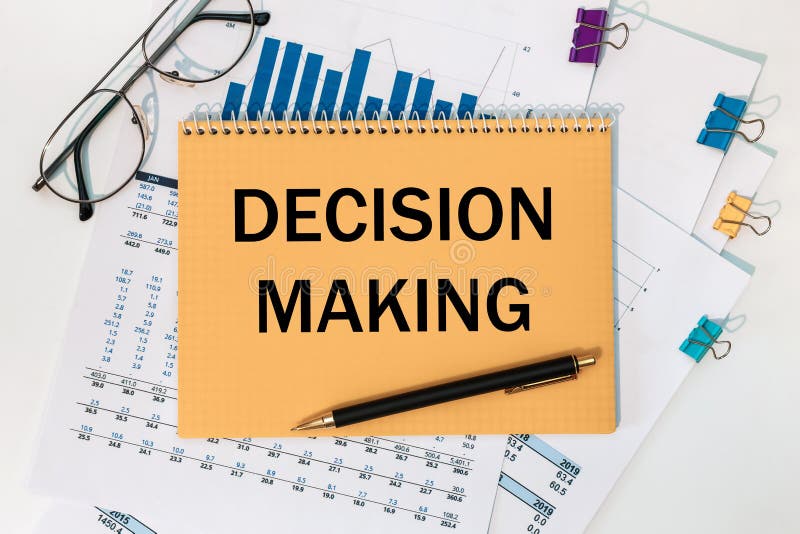 Text DECISION MAKER on White Notepad, Glasses, Graphs and Diagrams ...