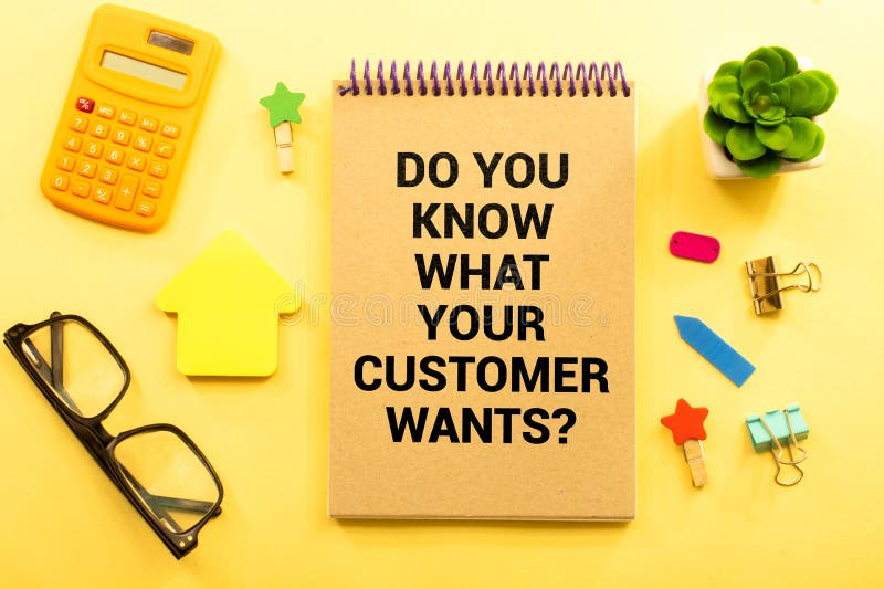 Notebook with Text DO YOU KNOW YOUR CUSTOMER on a Table with Sticks ...