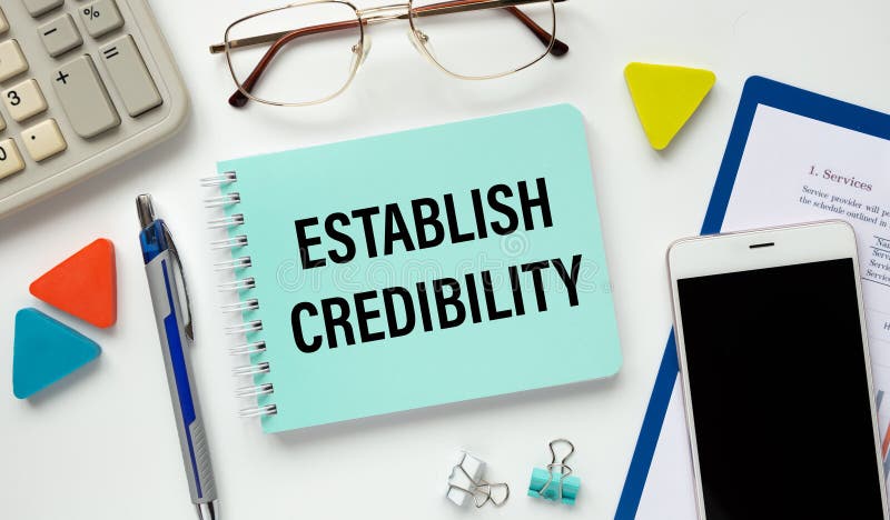 Notebook with Text ESTABLISH CREDIBILITY Near Office Supplies Stock ...