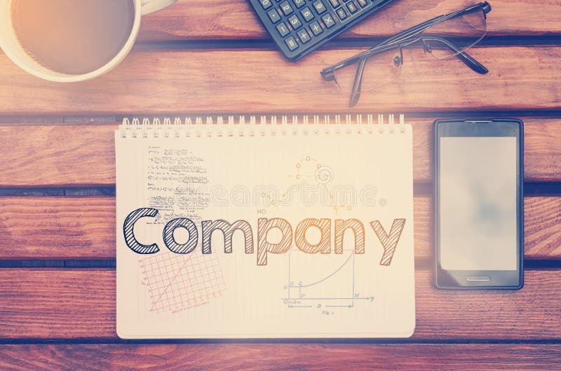 Notebook with Text Inside Company on Table with Coffee, Mobile P Stock ...