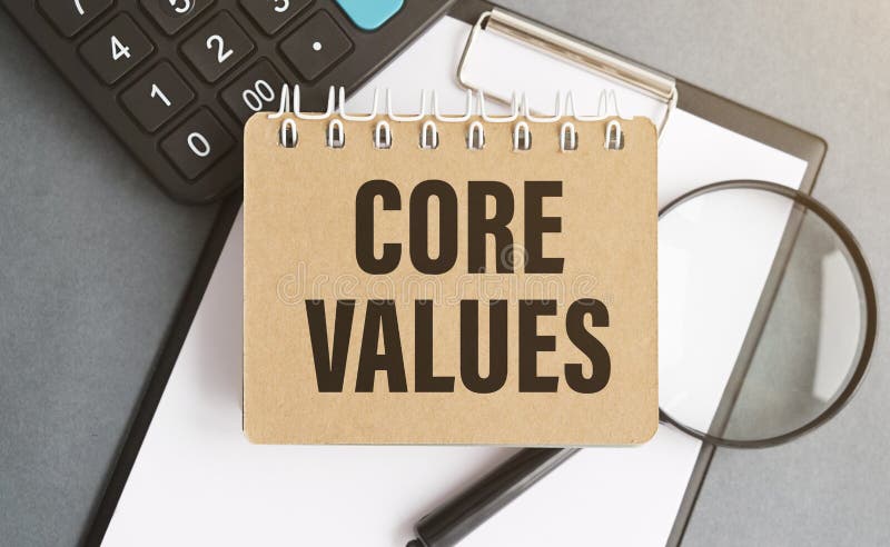 Text Inside Core Values on Table with Calculator, Laptop and Some Sheet ...