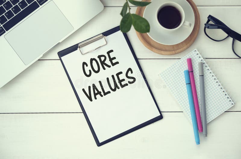 Notebook with Text Inside Core Values on Table with Coffee, Laptop and ...