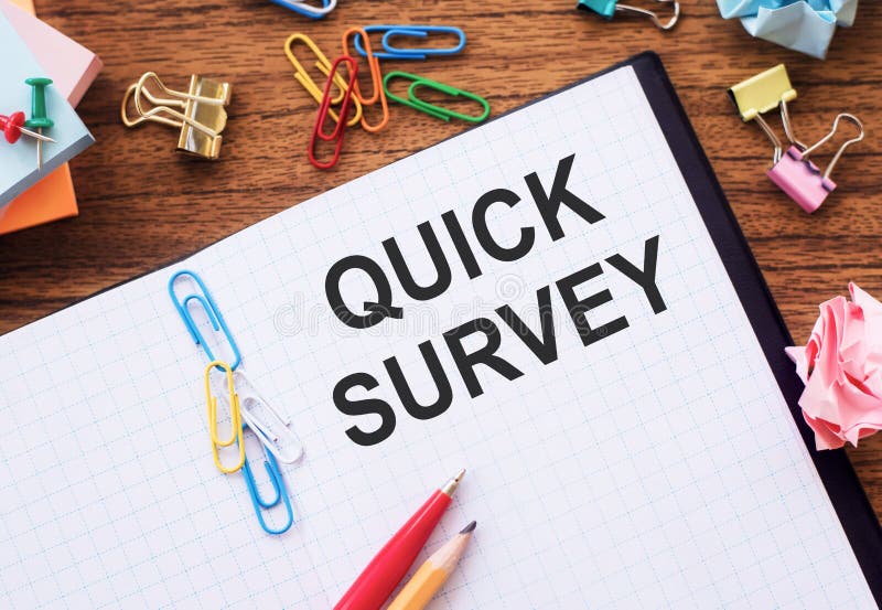 Notebook with Text QUICK SURVEY on a Table with Sticks, Colored Paper ...