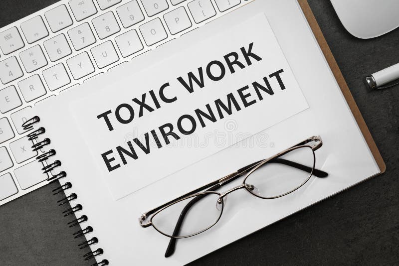 Notebook with Text Toxic Work Environment on Table, Flat Lay Stock ...